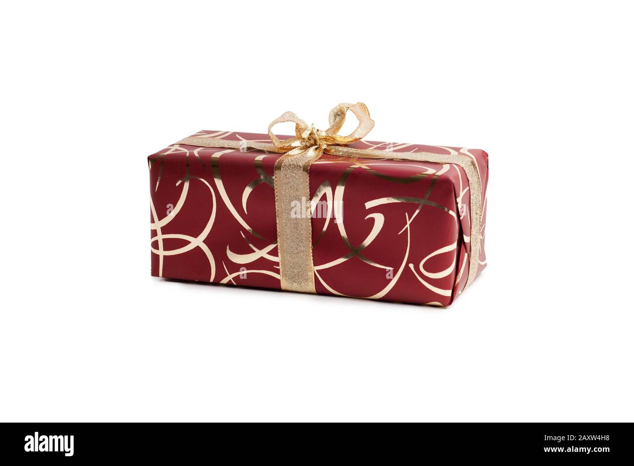 packaged rectangular gift in burgundy packaging with gold bow and gold ...