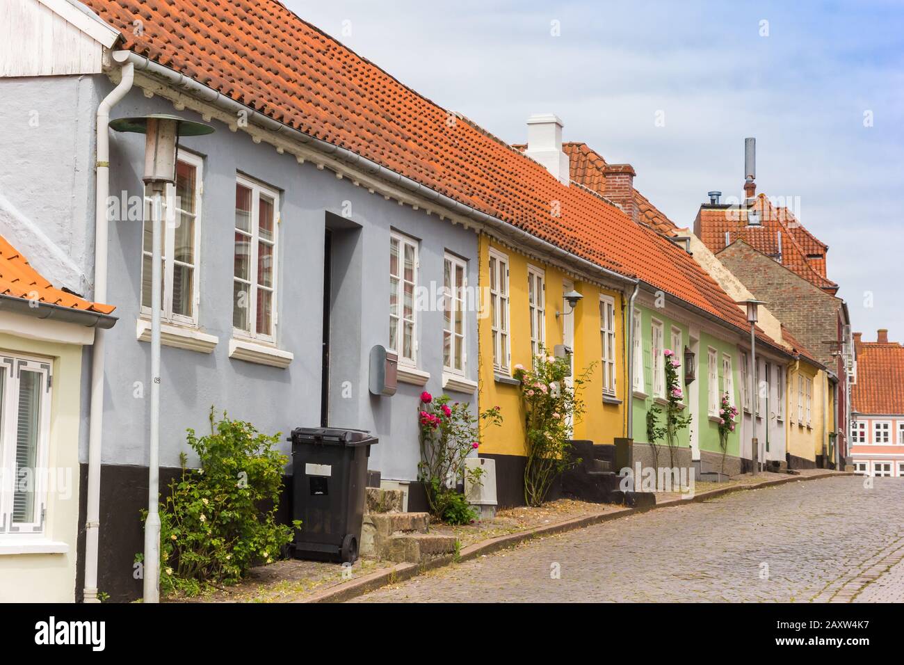 Colorful historic houses in a cobblestoned street of Haderslev, Denmark Stock Photo - Alamy