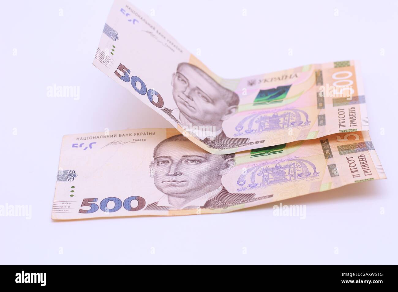 Two new banknotes in denominations of 500 Ukrainian hryvnias isolated ...
