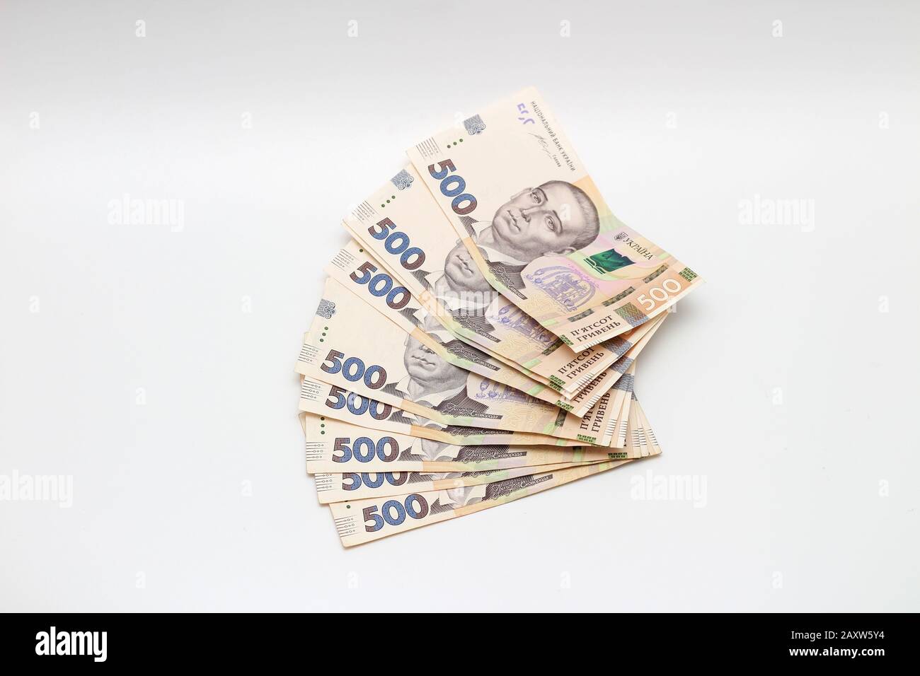 Pile of new banknotes in denominations of 500 Ukrainian hryvnias ...