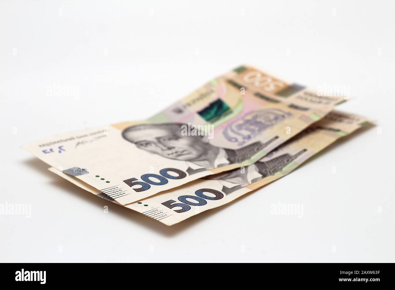 Two new banknotes in denominations of 500 Ukrainian hryvnias isolated ...