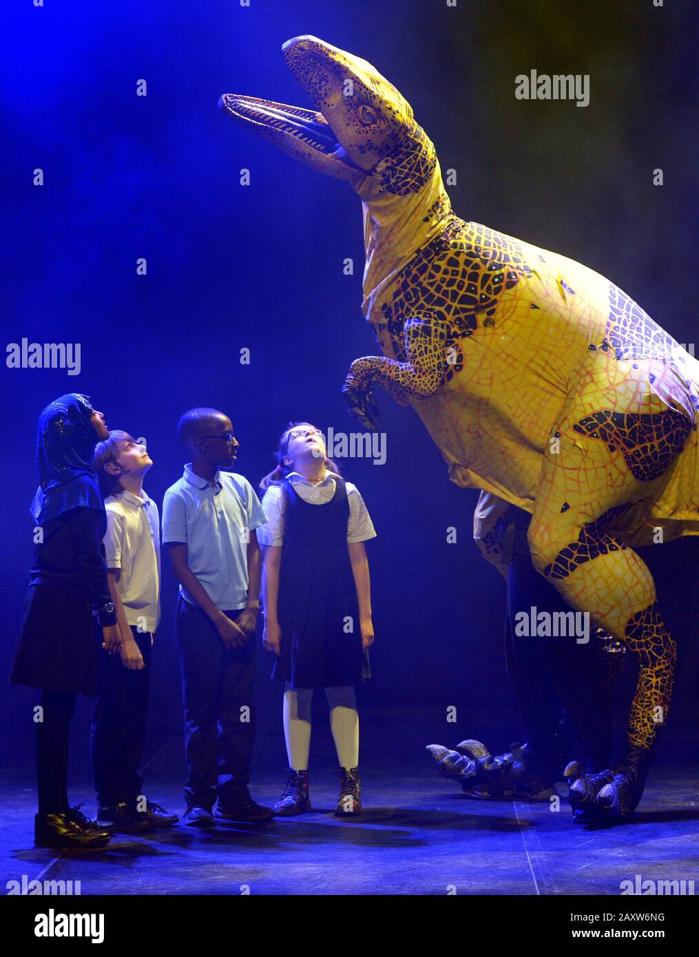 Children from Stockwell Primary School in London, interact with a ...