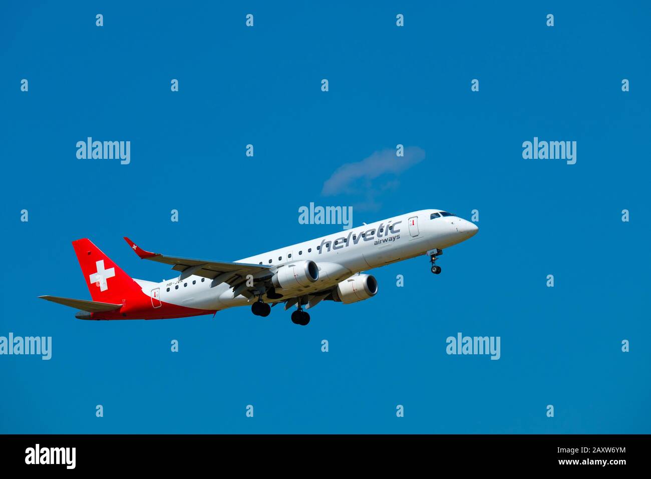 Big plane during flight in sky Stock Photo - Alamy