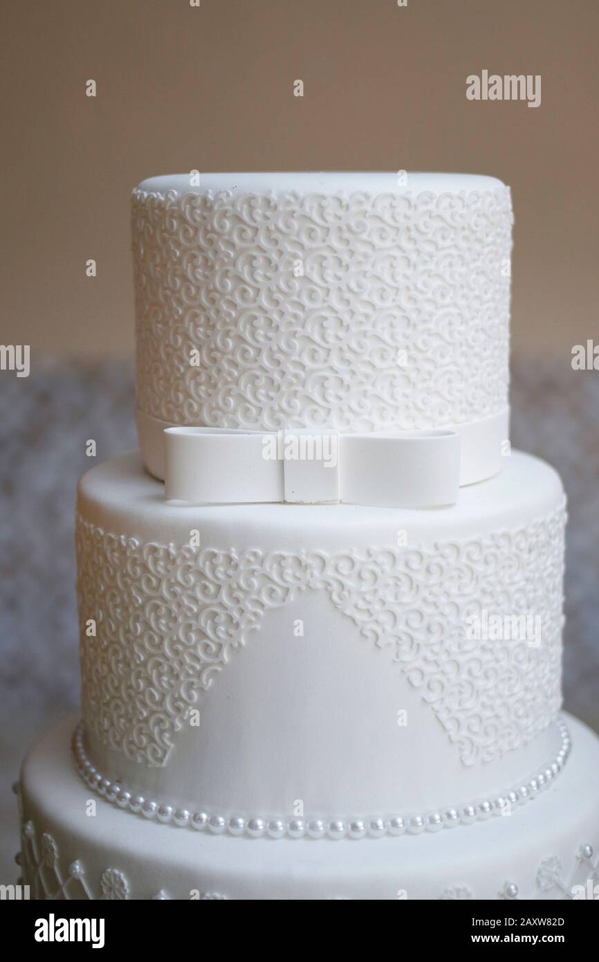 beautiful white party cake decorated with textures Stock Photo - Alamy
