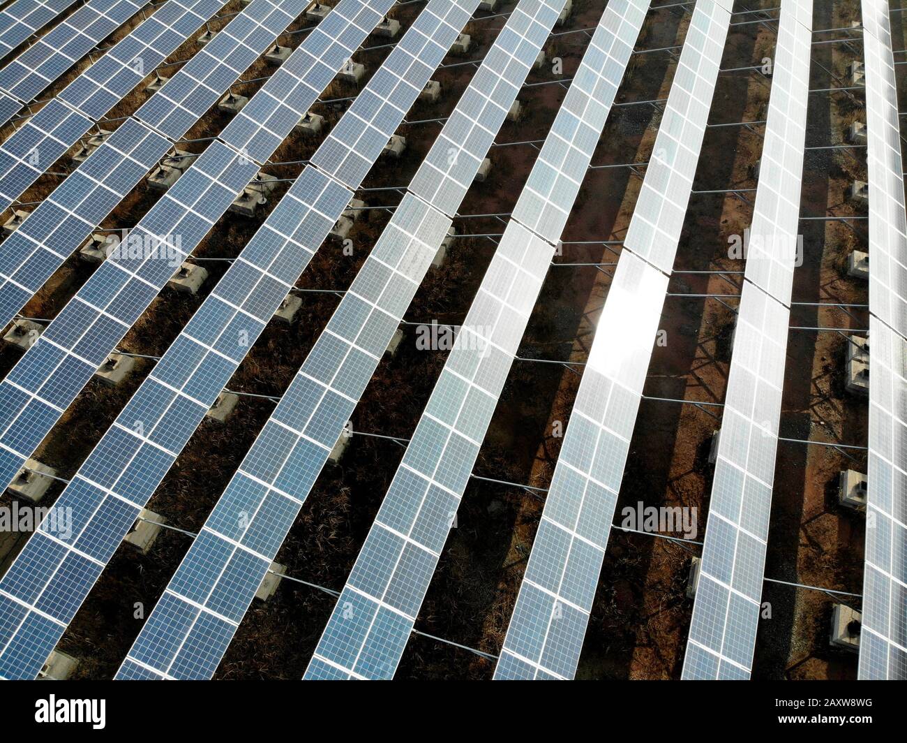 View of arrays of solar panels at a photovoltaic power station in ...