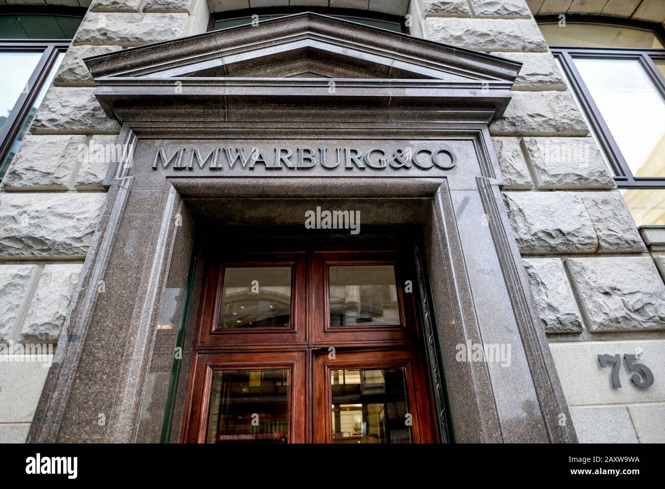 Hamburg, Germany. 13th Feb, 2020. The logo of the bank M.M.Warburg & CO is attached in large ...