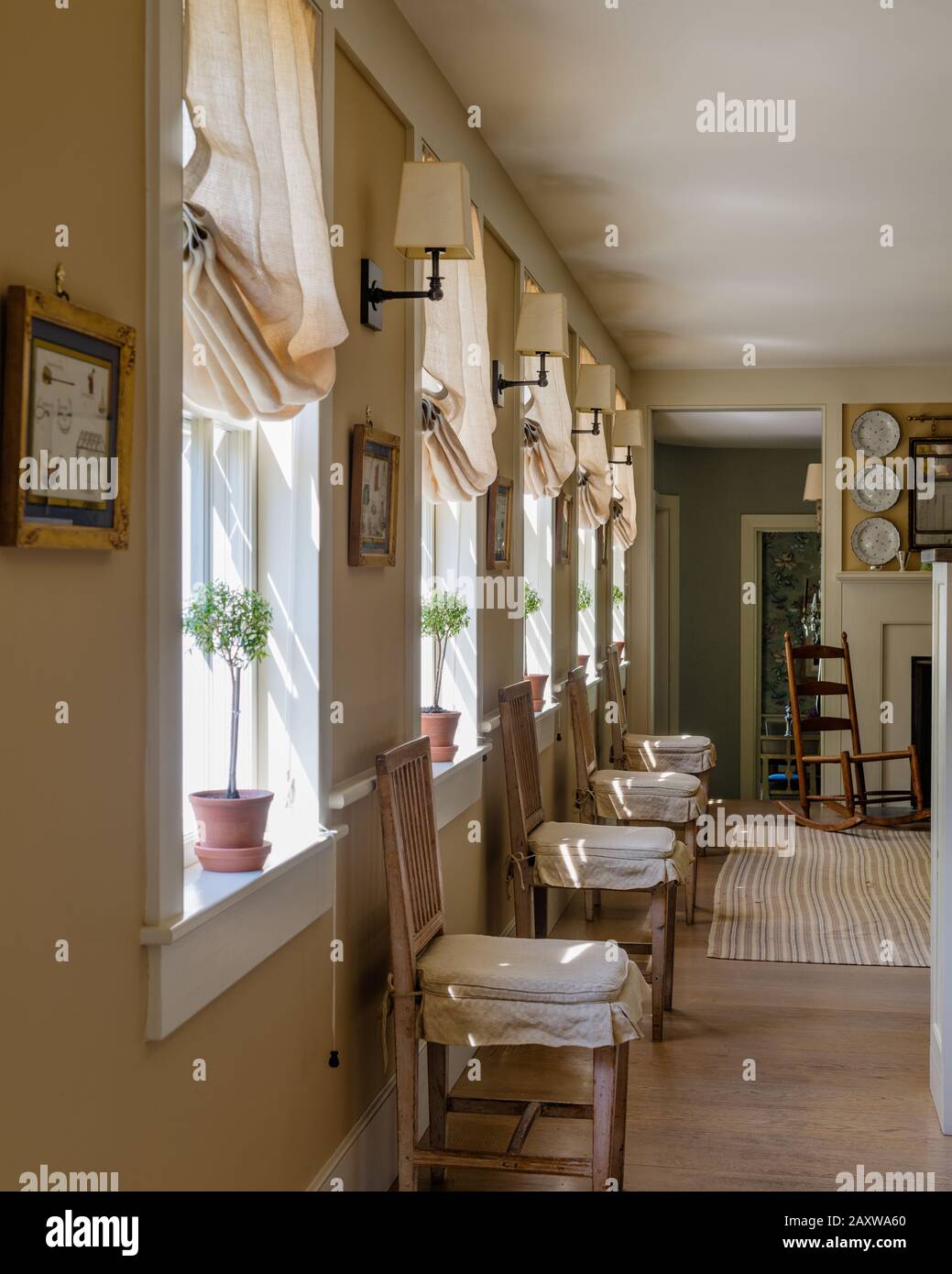 Row of rocking chairs hi-res stock photography and images - Alamy