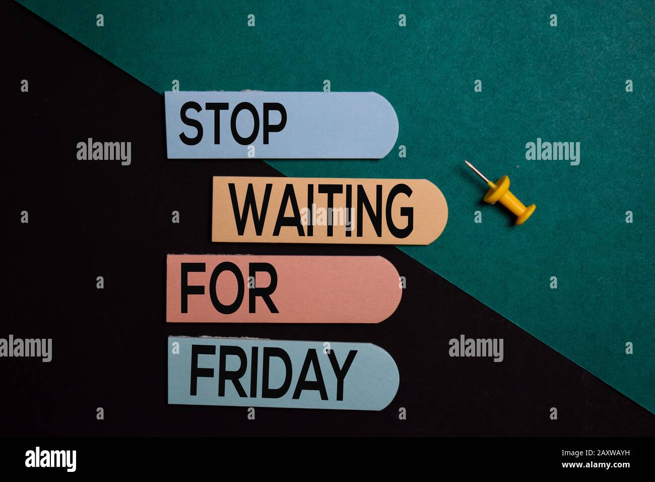 Stop Waiting For Friday write on a sticky note isolated on Office Desk ...