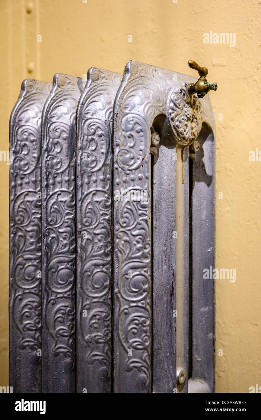 Antique old metal steam radiator Stock Photo - Alamy