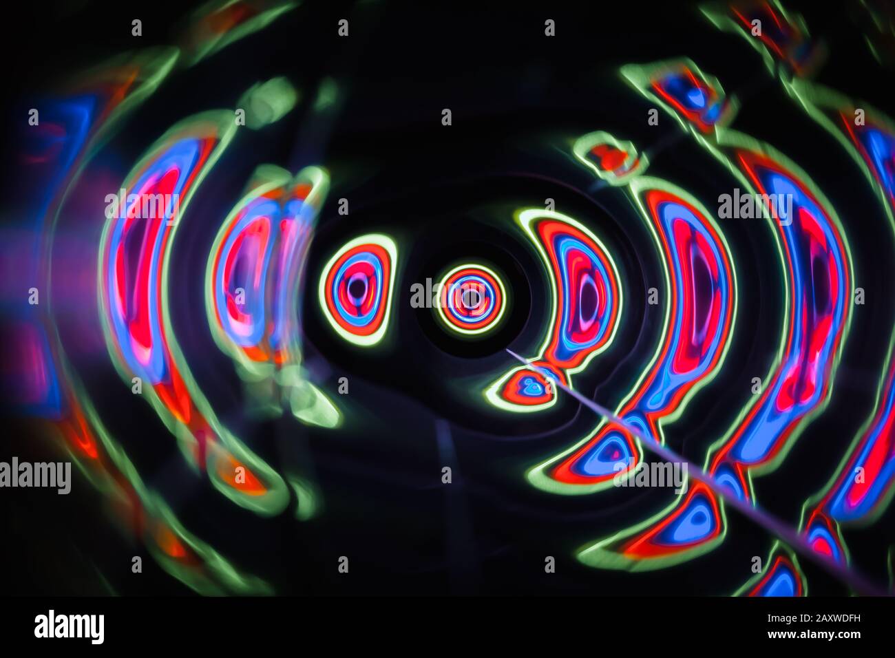 Sound waves in the dark in full color Stock Photo - Alamy
