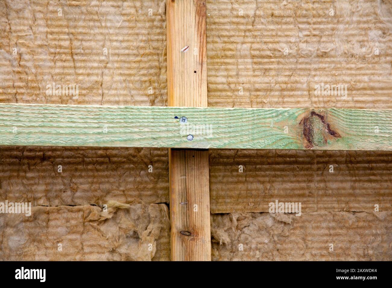 warming the walls of a stone house with a stone wool heater. Ecological ...