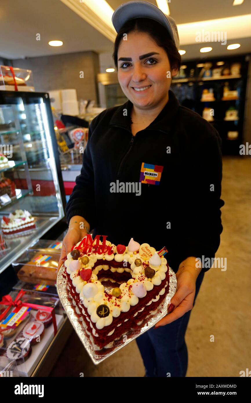 Beirut, Lebanon. 13th Feb, 2020. A staff member of a bakery displays a ...