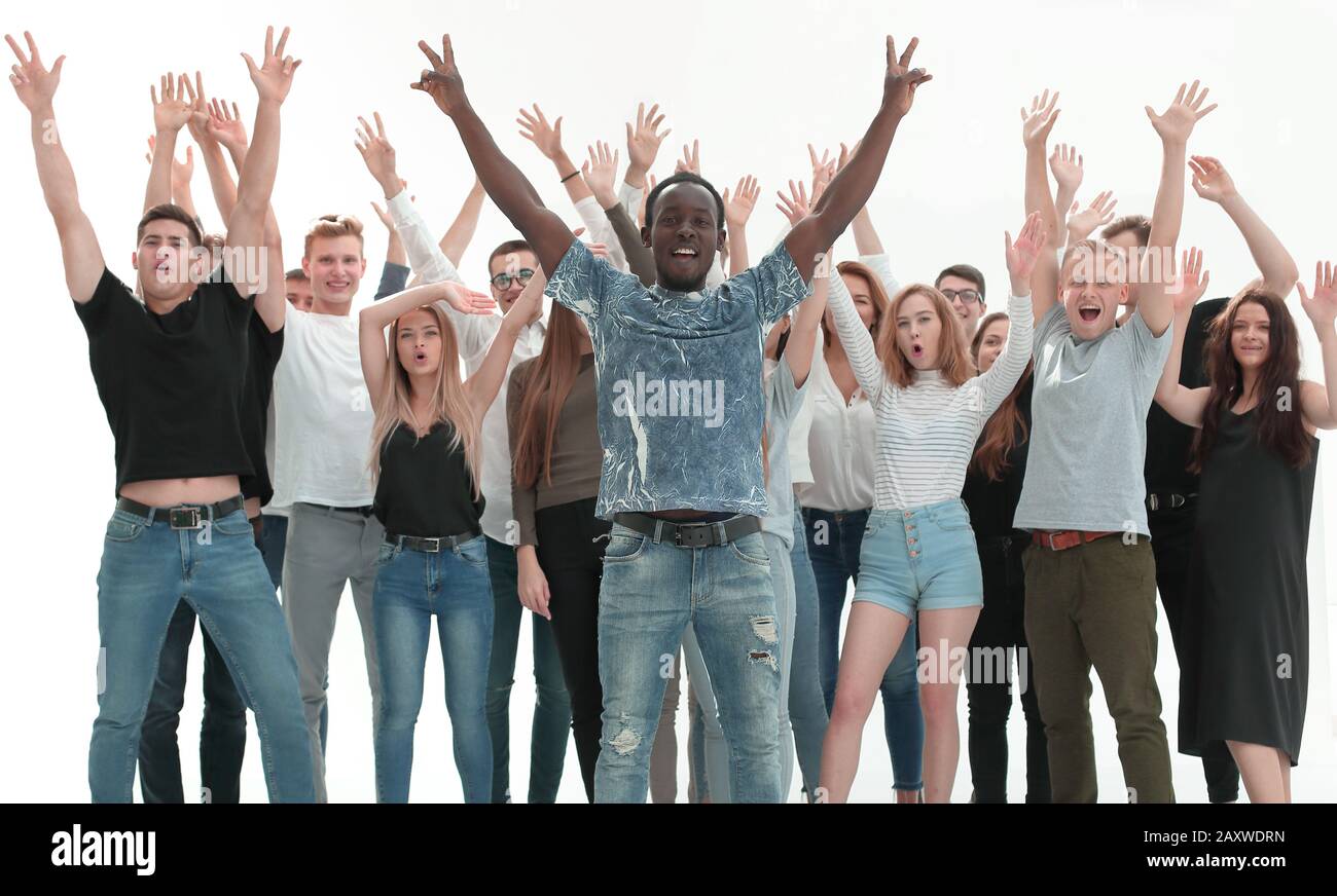 leader standing in front of a cheerful group of young people Stock ...