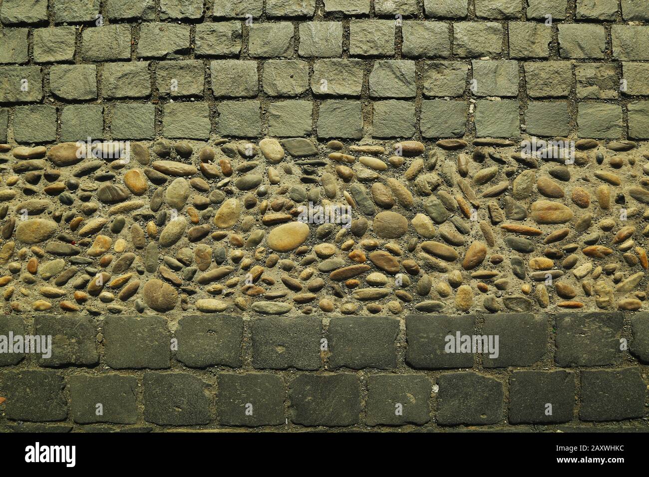 Tramway line and cobblestone tile pavement. Top view. Abstract street ...
