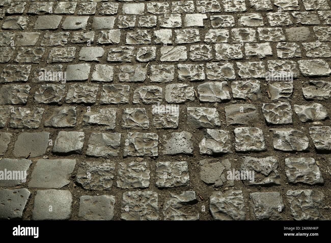 Tramway line and cobblestone tile pavement. Top view. Abstract street ...
