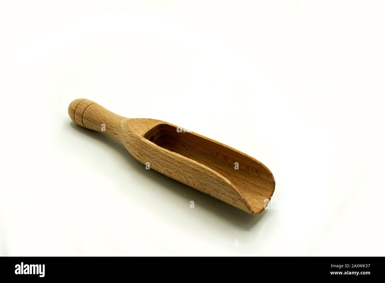 Wooden kitchen utensils on white background. Rustic wooden shovel Stock ...