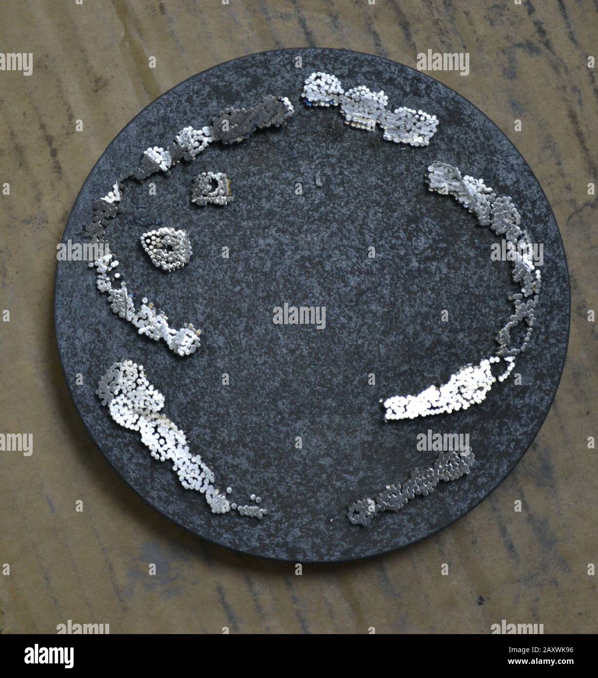 The working disk of the laser unit for melting the metal and the ...