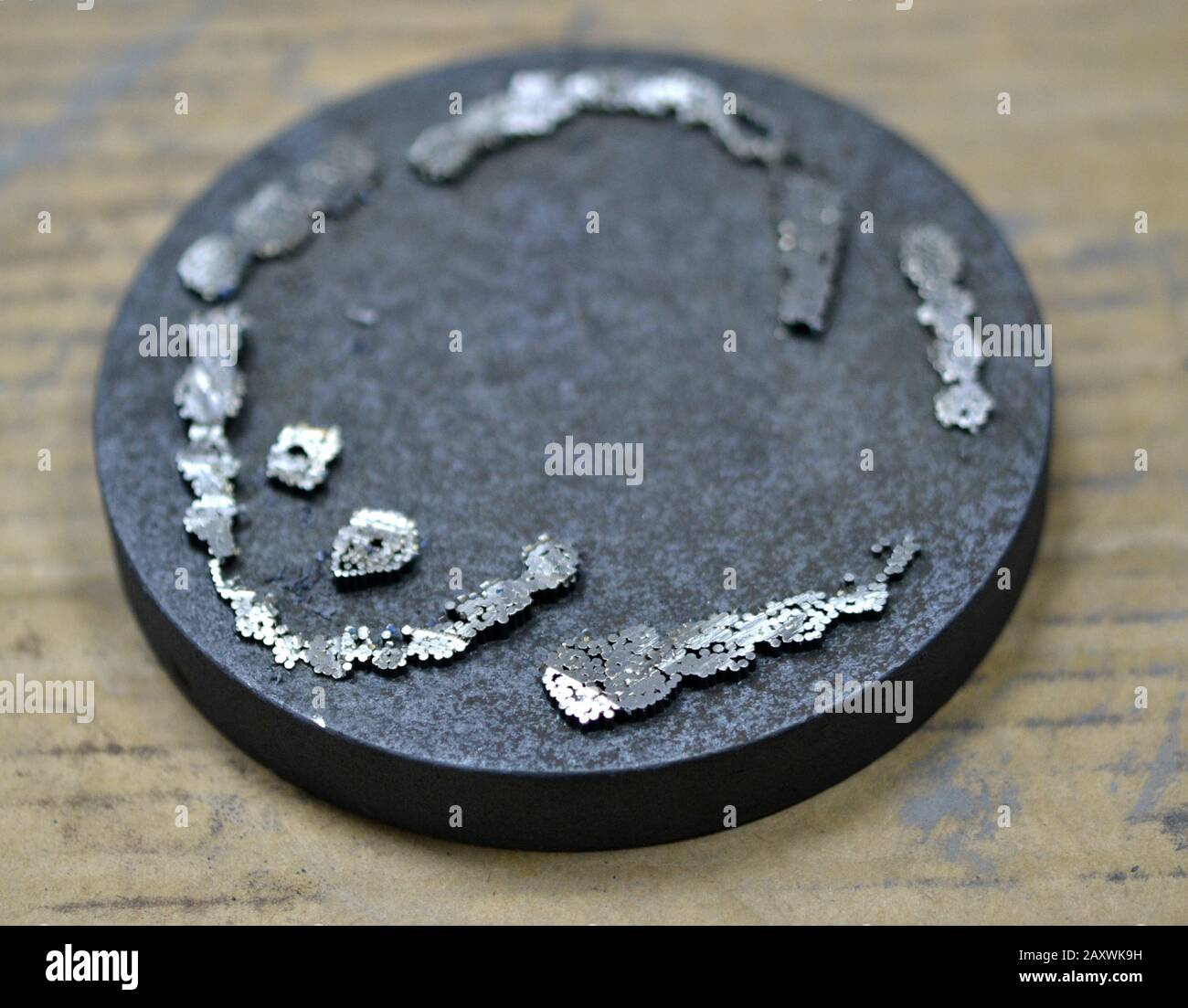 The working disk of the laser unit for melting the metal and the ...