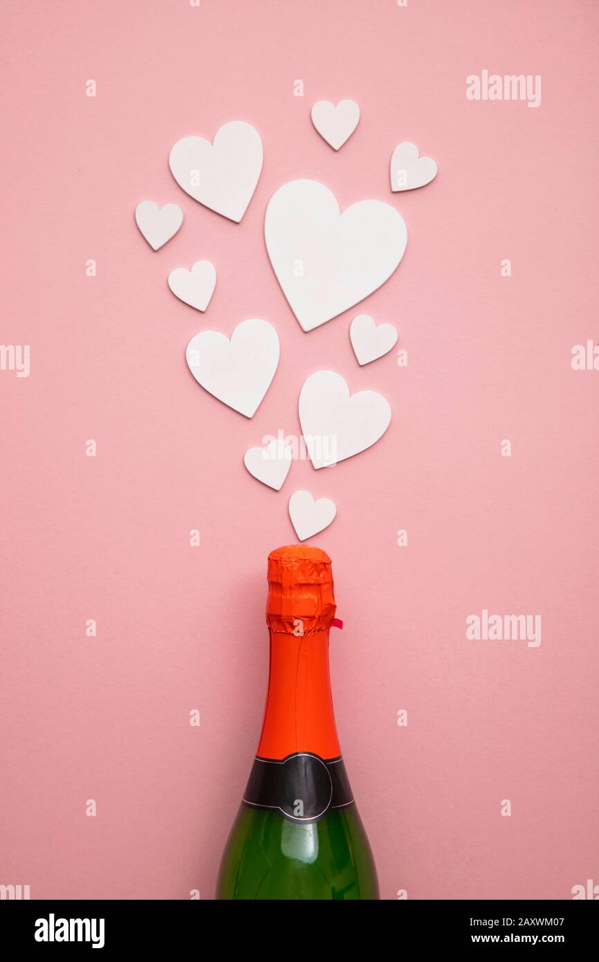 Romantic love hearts exploding from a bottle of champagne Stock Photo ...