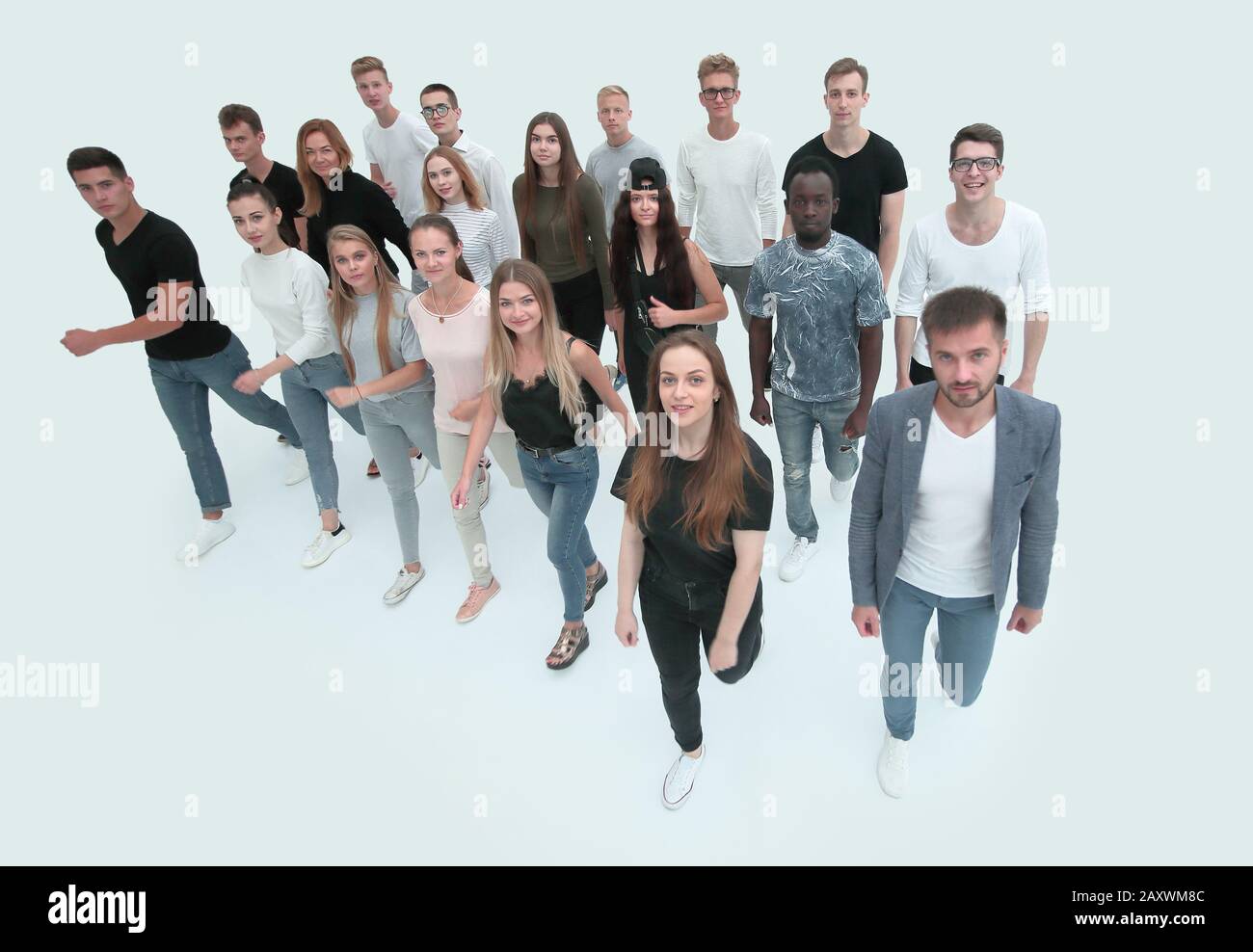 top view. a group of confident young men striding forward Stock Photo ...