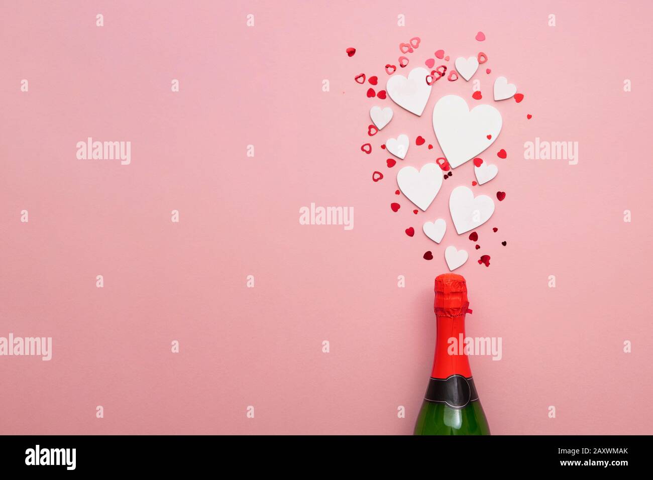 Romantic love hearts exploding from a bottle of champagne Stock Photo ...