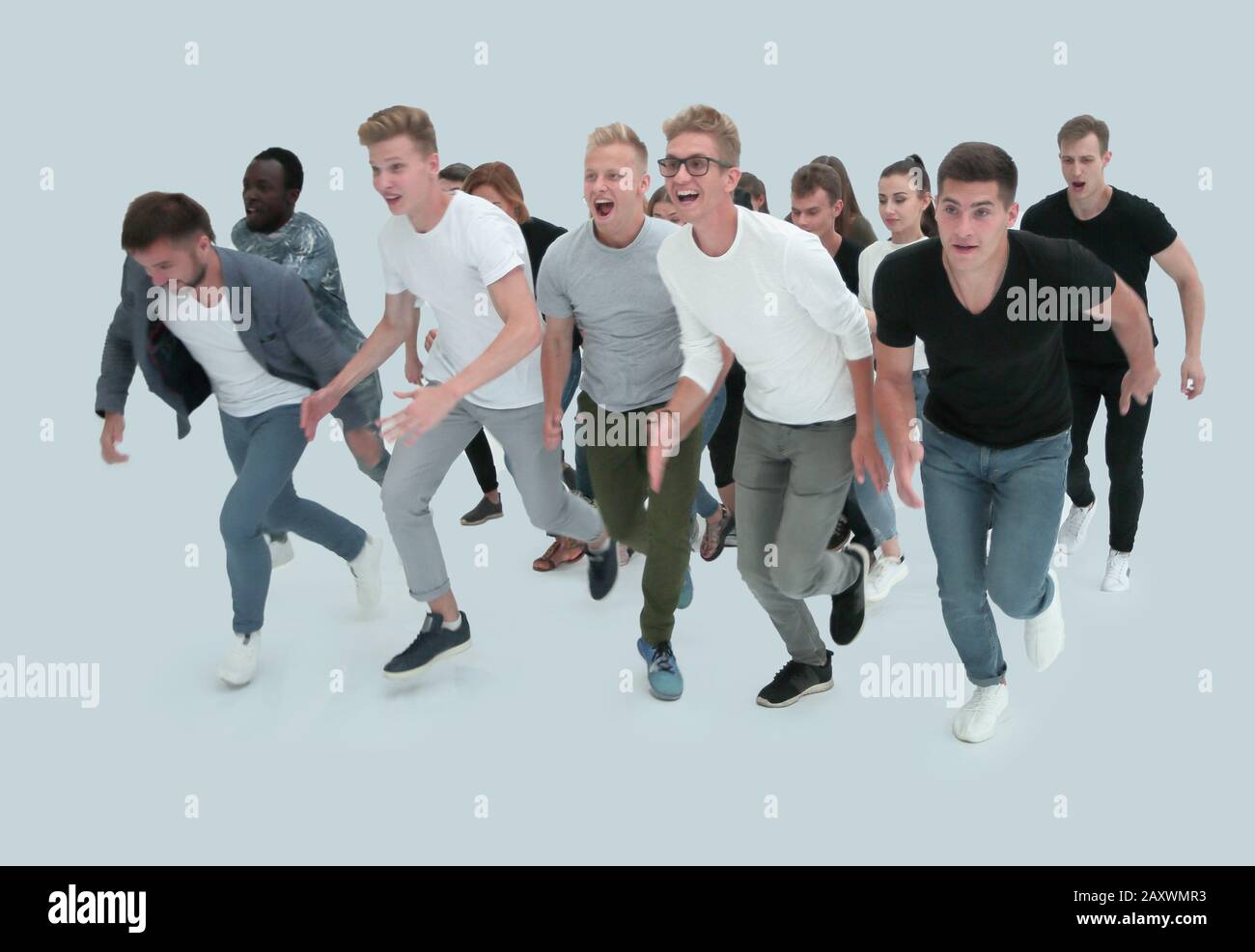 in full growth. a group of young people running forward Stock Photo - Alamy