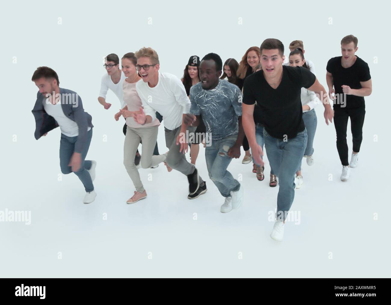 in full growth. a group of young people running forward Stock Photo - Alamy