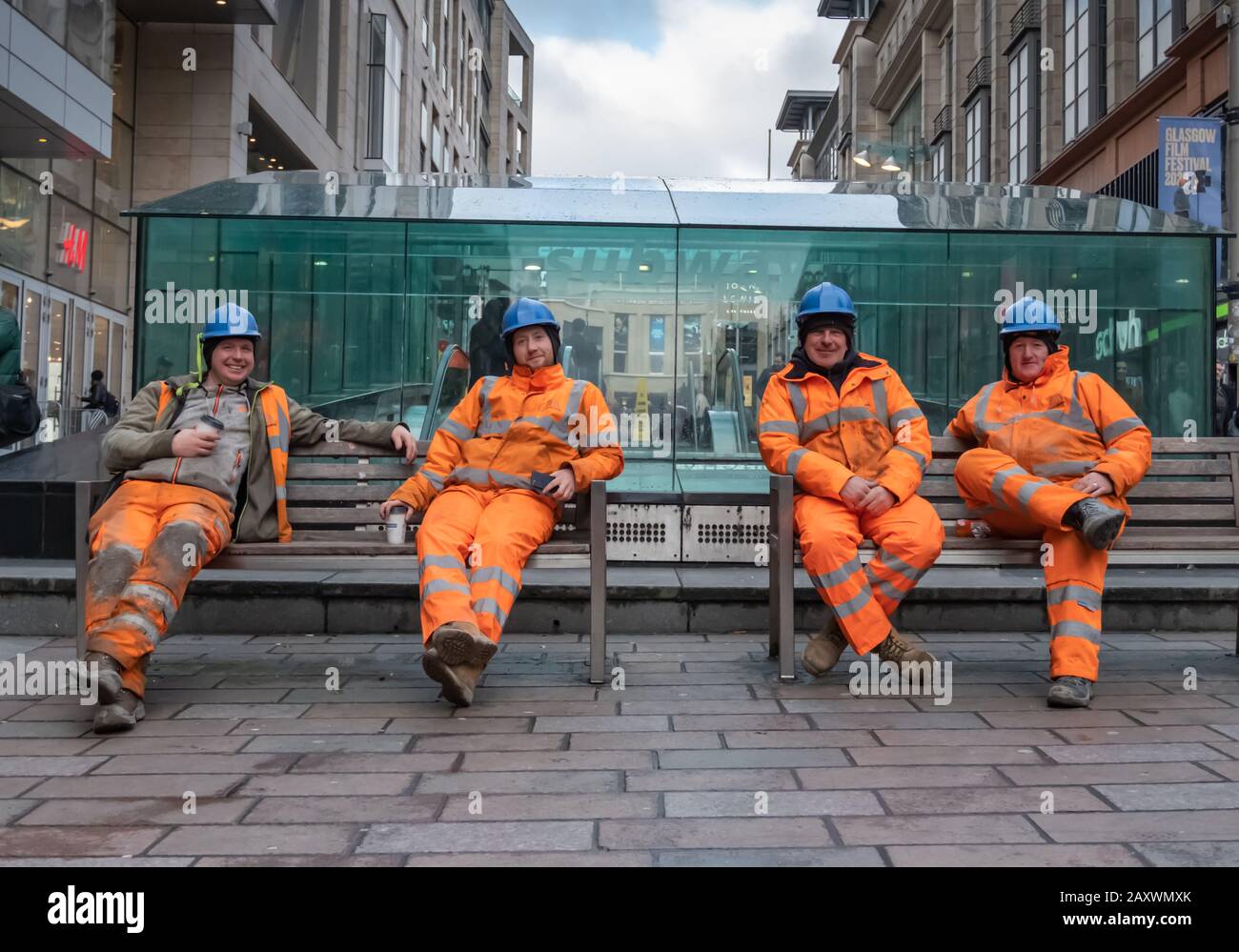 Glasgow, Scotland, UK. 13th February, 2020. Four construction workers ...