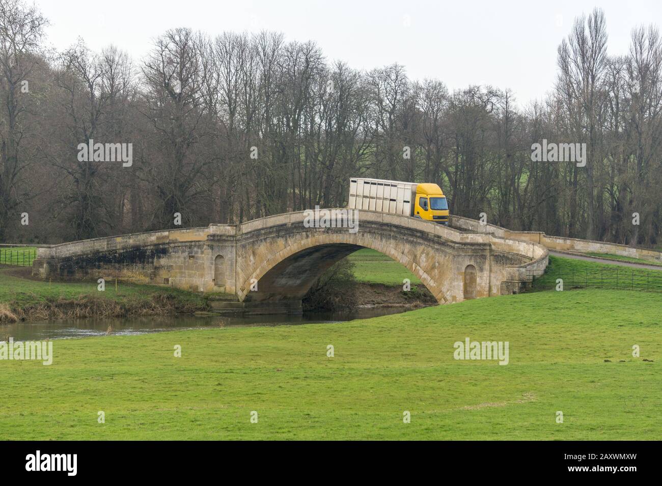 Lorry crossing the historic Tyringham Bridge, which spans the River ...