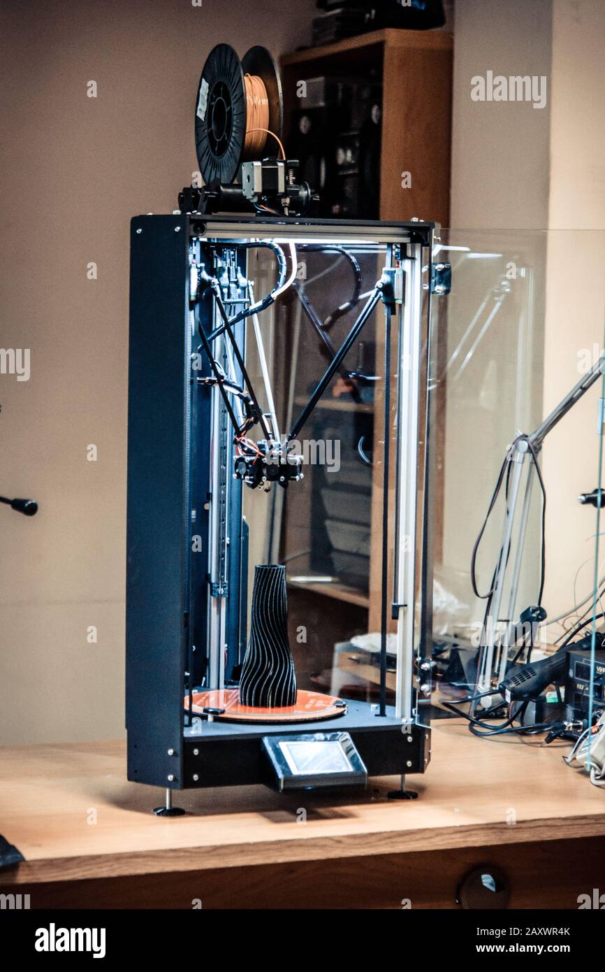 The technology of creating a model on a 3d printer close-up ...