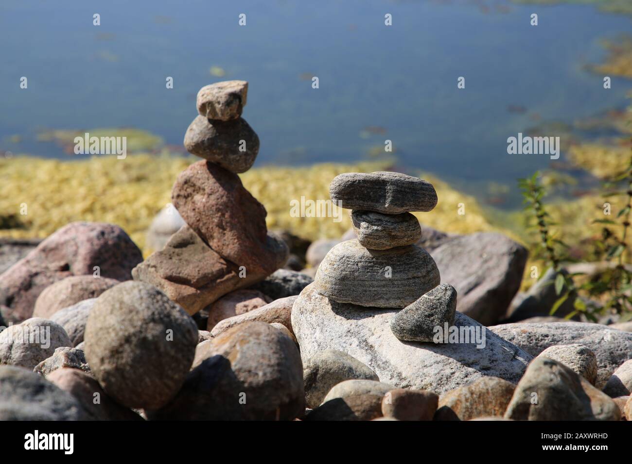 Stacks of natural rocks by the beach of lake Valkeinen in Kuopio ...