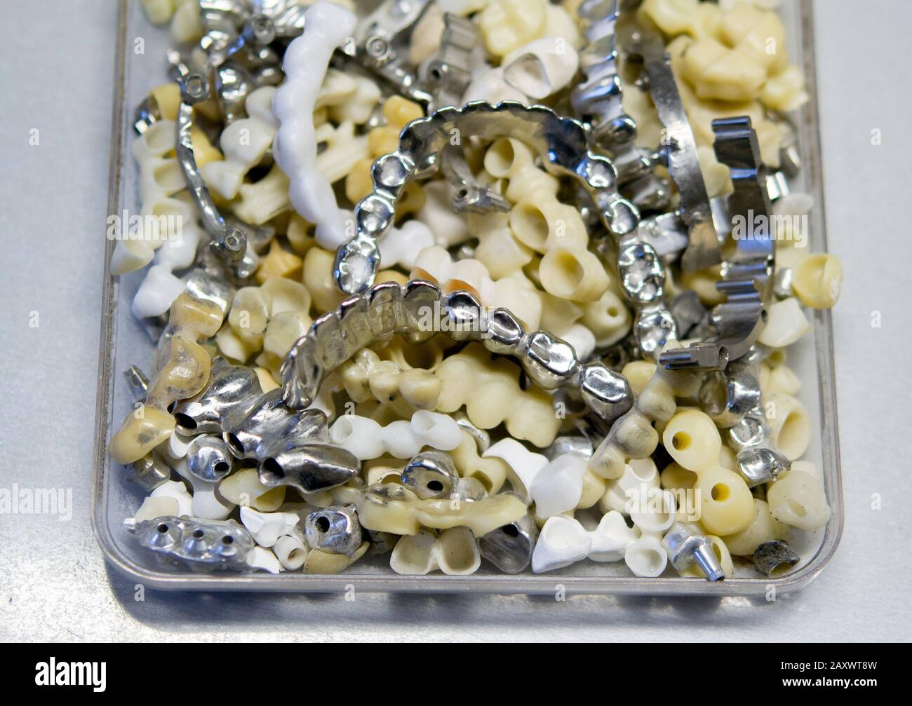 Many different medical dental bridges close-up lab Stock Photo - Alamy