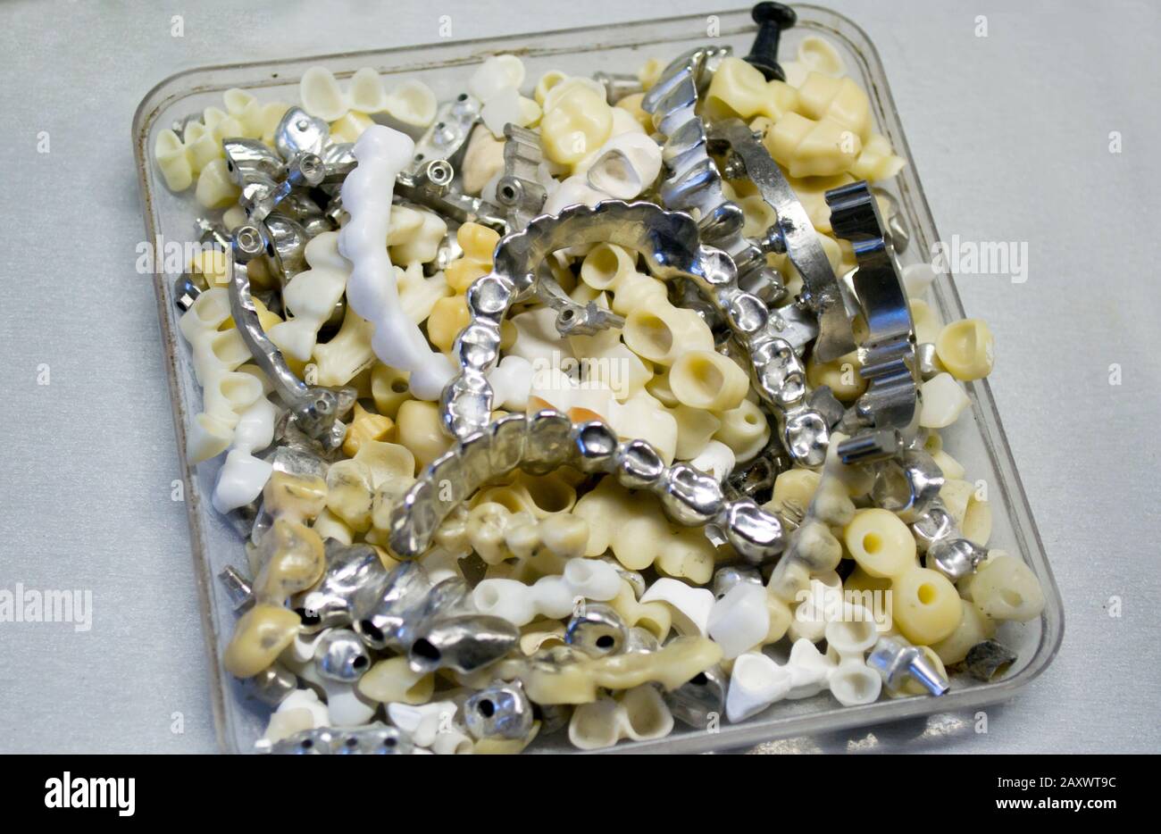 Many different medical dental bridges close-up lab Stock Photo - Alamy