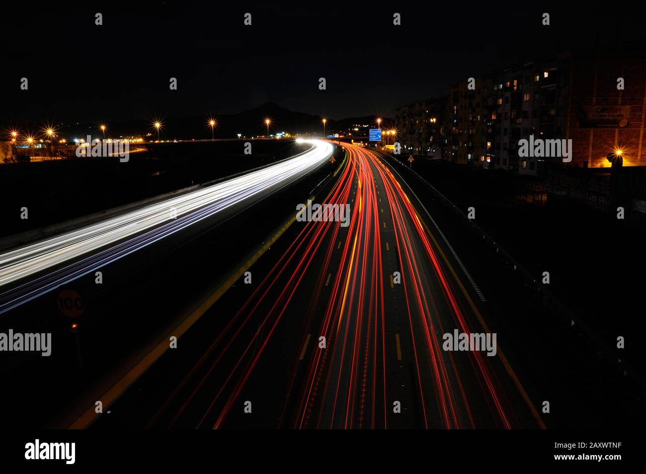 cars on the road at night in the city Stock Photo - Alamy