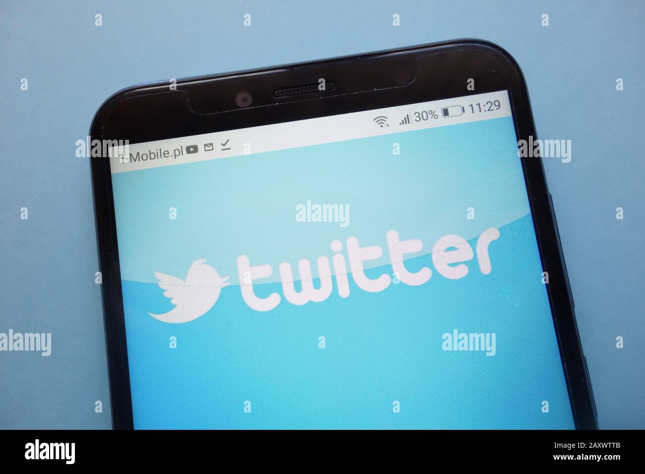 Twitter logo displayed on smartphone Stock Photo - Alamy