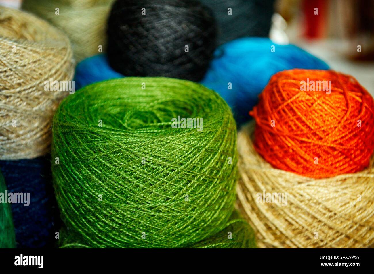 Piles of lanyards & twines balls of different sizes and colors Stock ...