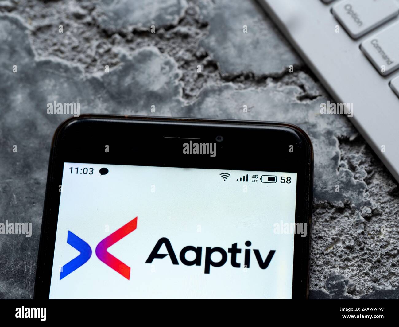 In this photo illustration an Aaptiv logo seen displayed on a ...