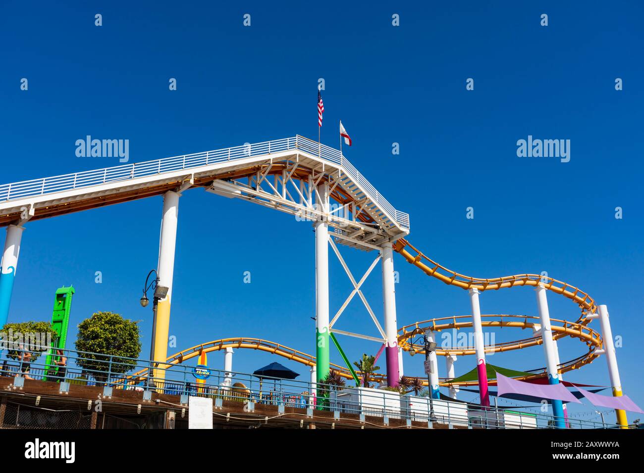 Santa Monica pier with Pacific Park amusements, roller coaster ...