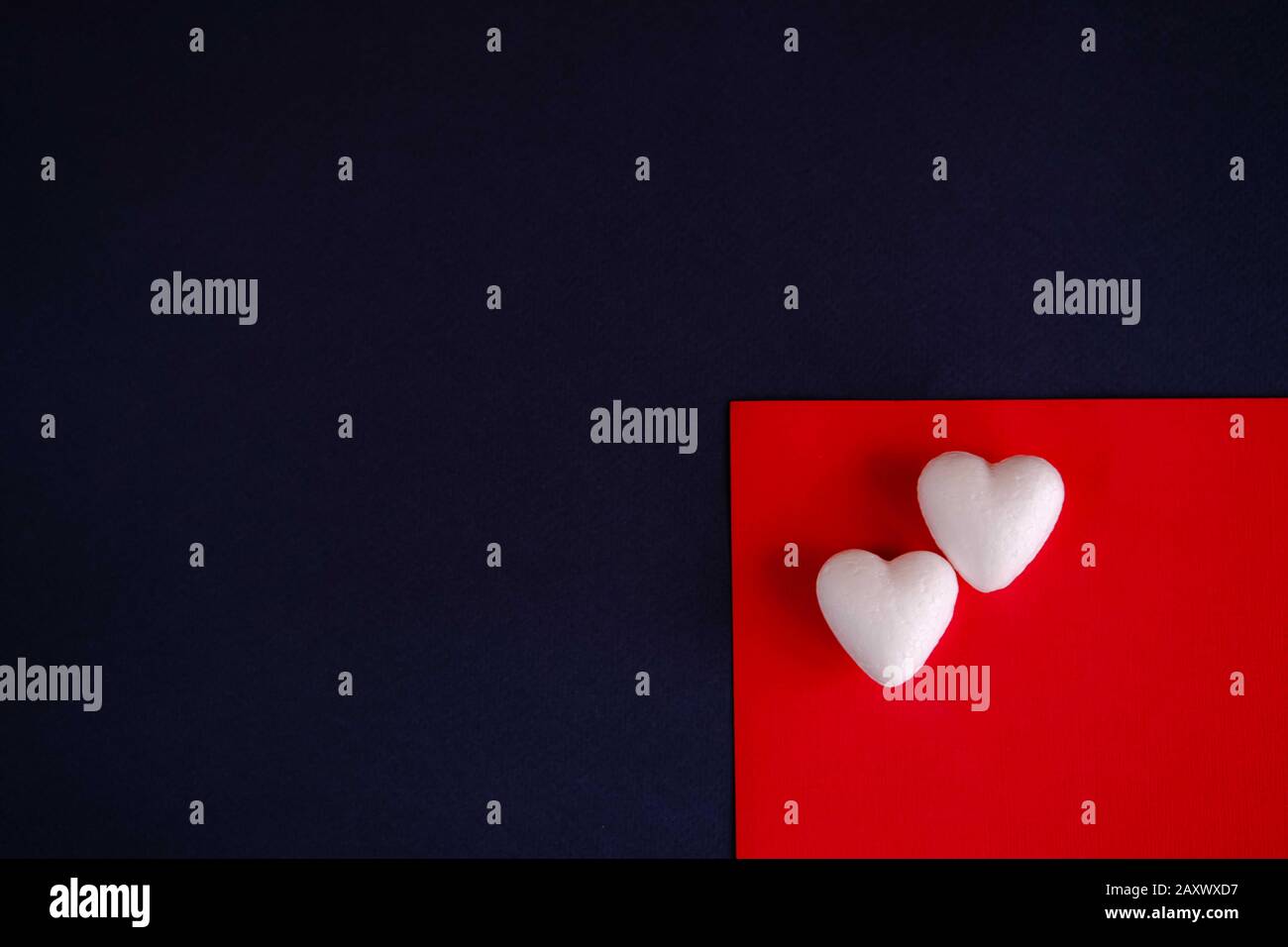 Abstract Geometric red and blue paper Background with white heart ...