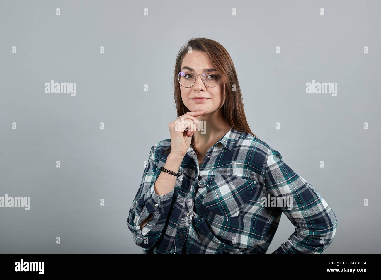 Woman acting smart hi-res stock photography and images - Alamy
