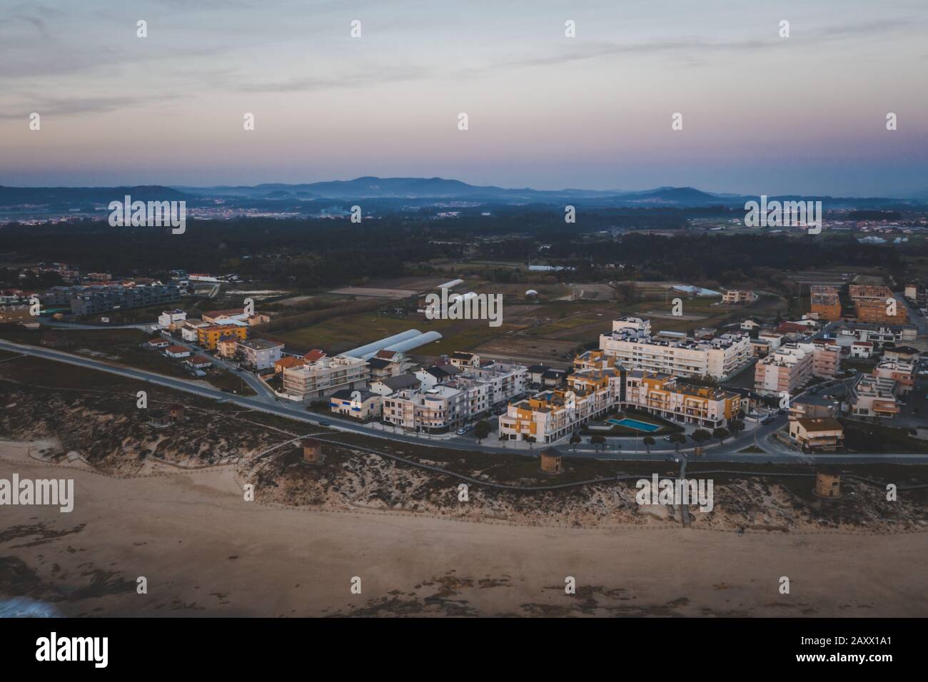 Bird's eye view of a city with old buildings in the evening with ...