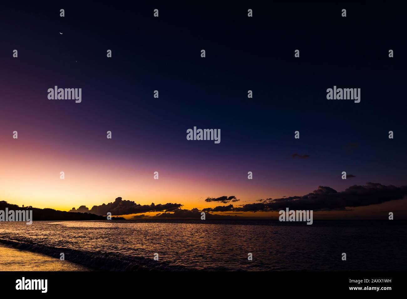 Sunset with new Moon and Venus over Grand Anse Beach, St George's ...