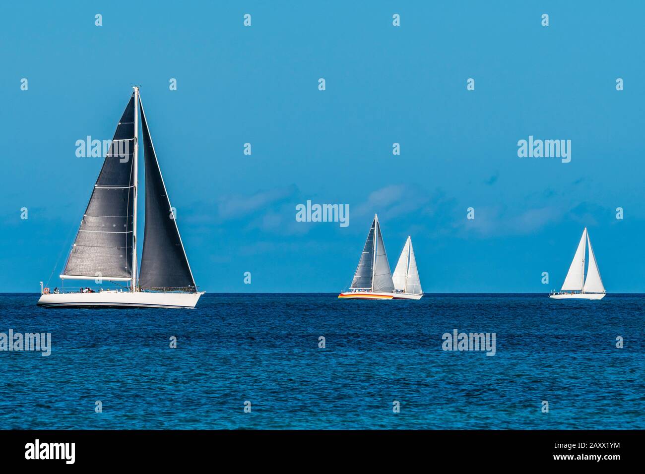 A line of racing yachts at Grand Anse Beach, St George's, Grenada Stock ...