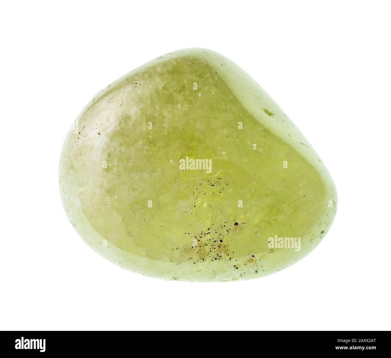 polished grossular (green garnet) gem stone cutout on white background ...
