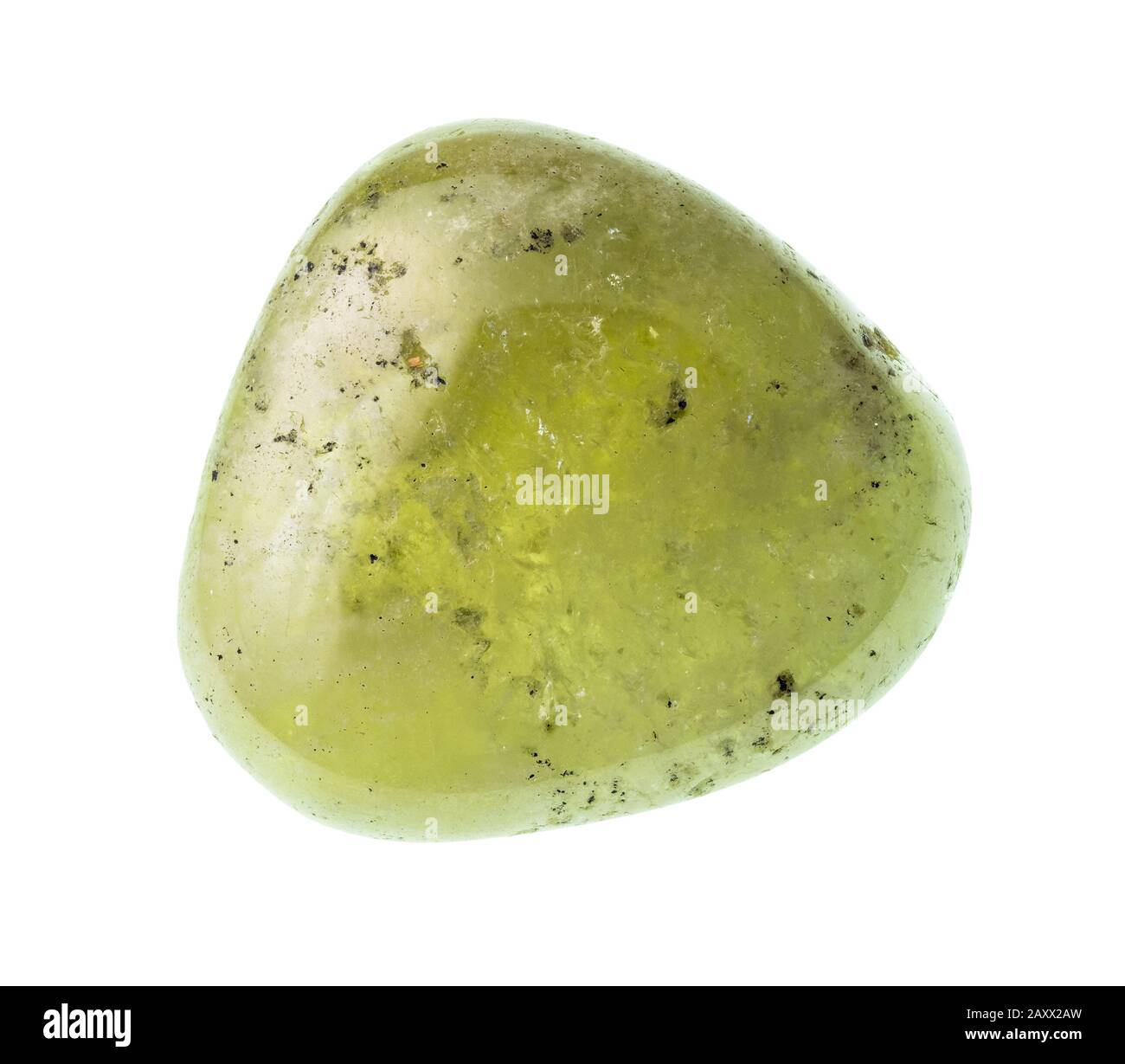 polished grossular (green garnet) gemstone cutout on white background ...