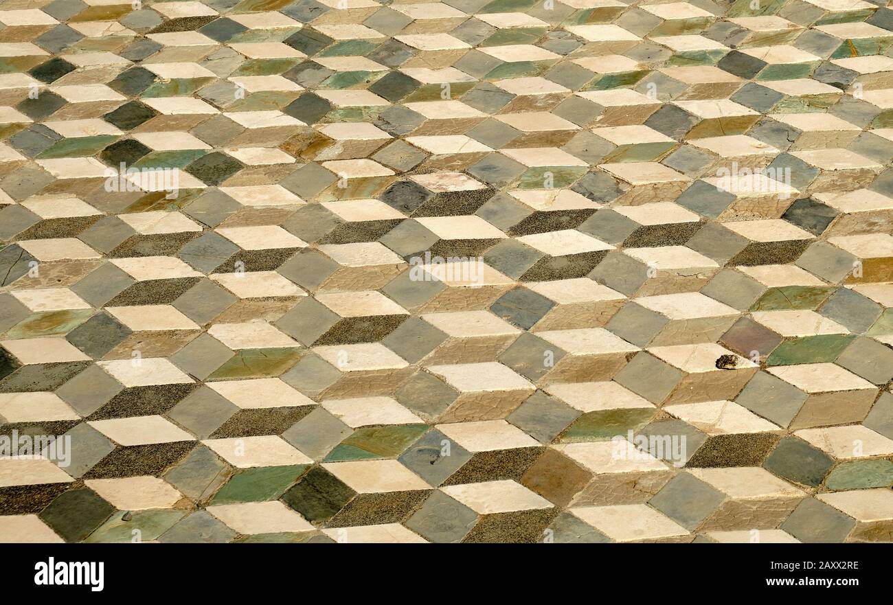 A Roman mosaic floor depicts an optical illusion at the House of the ...
