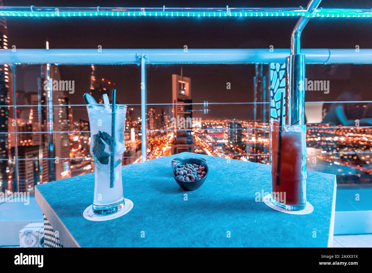 Two glass glasses with alcoholic cocktails in the rooftop bar ...
