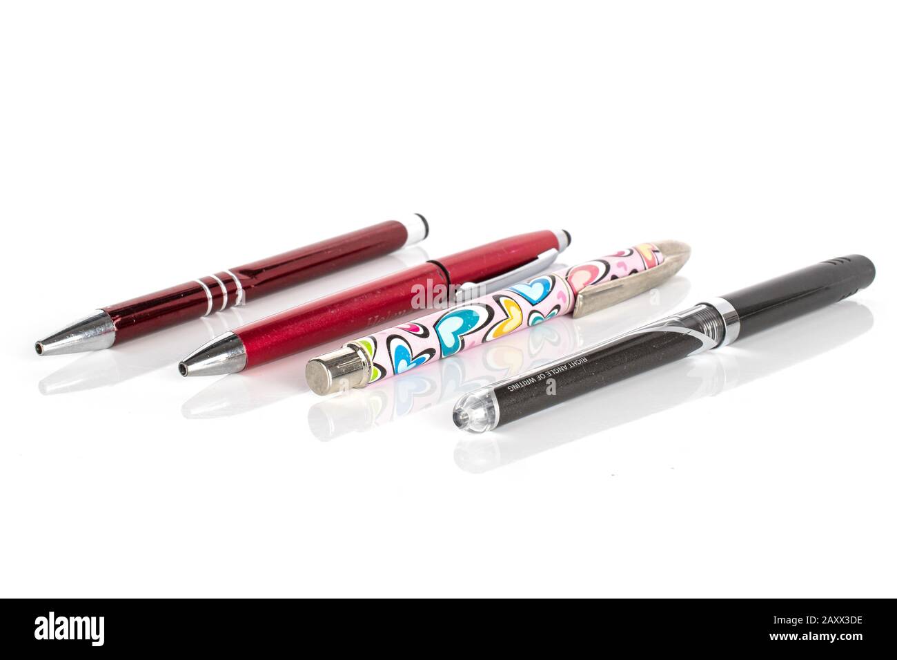 Group of four whole writing ballpoint pen isolated on white background ...