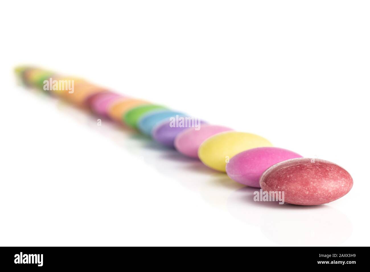 Lot of whole small sweet colourful candy isolated on white background ...