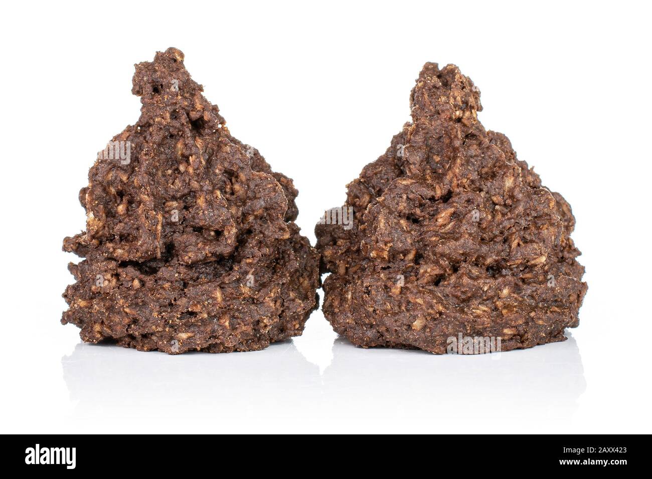 Group of two whole homemade brown coconut cocoa biscuit isolated on ...